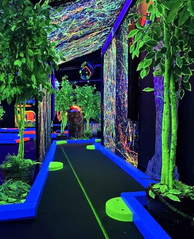 A jungle canopy glows overhead while you navigate the course, making you feel like a tropical explorer with a putter.