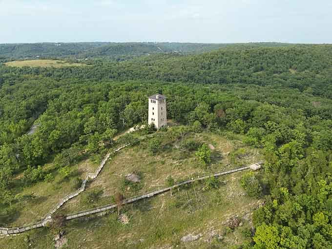 This water tower rises from the forest like a sentinel watching over the park's hidden treasures.