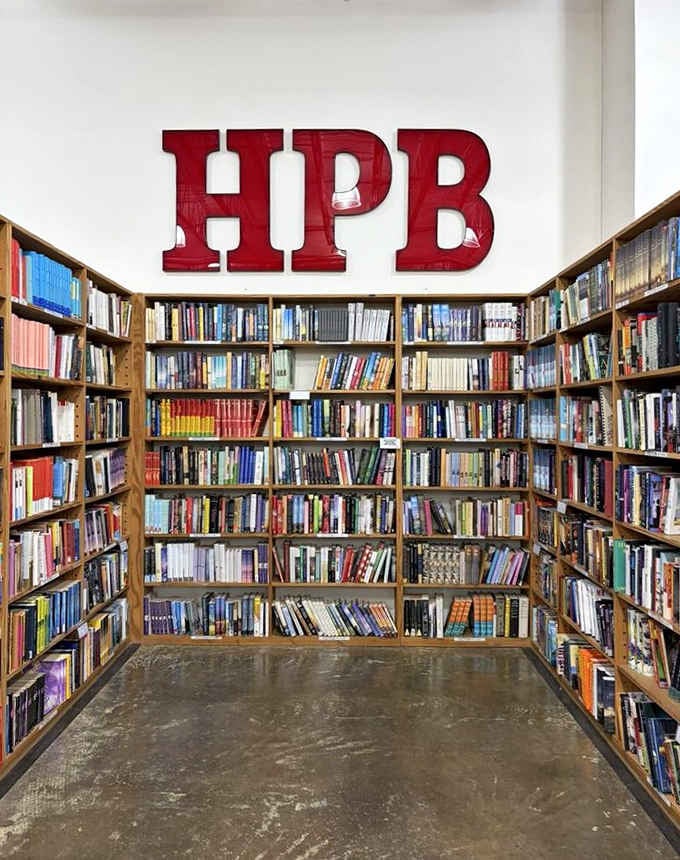 The iconic HPB letters tower over shelves packed with every genre imaginable, from romance to rocket science.