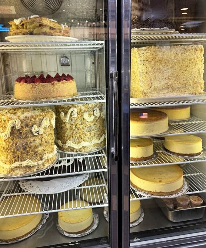 The dessert case displays enough cheesecakes to feed a wedding reception or one determined customer.
