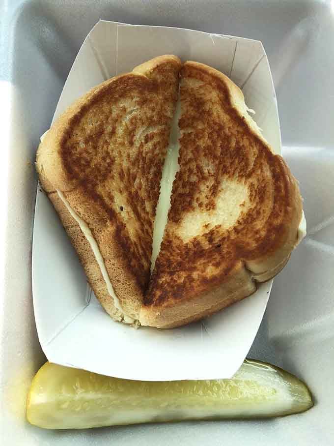 A grilled cheese sandwich toasted to golden perfection, proving that sometimes the simplest things in life are also the most satisfying.