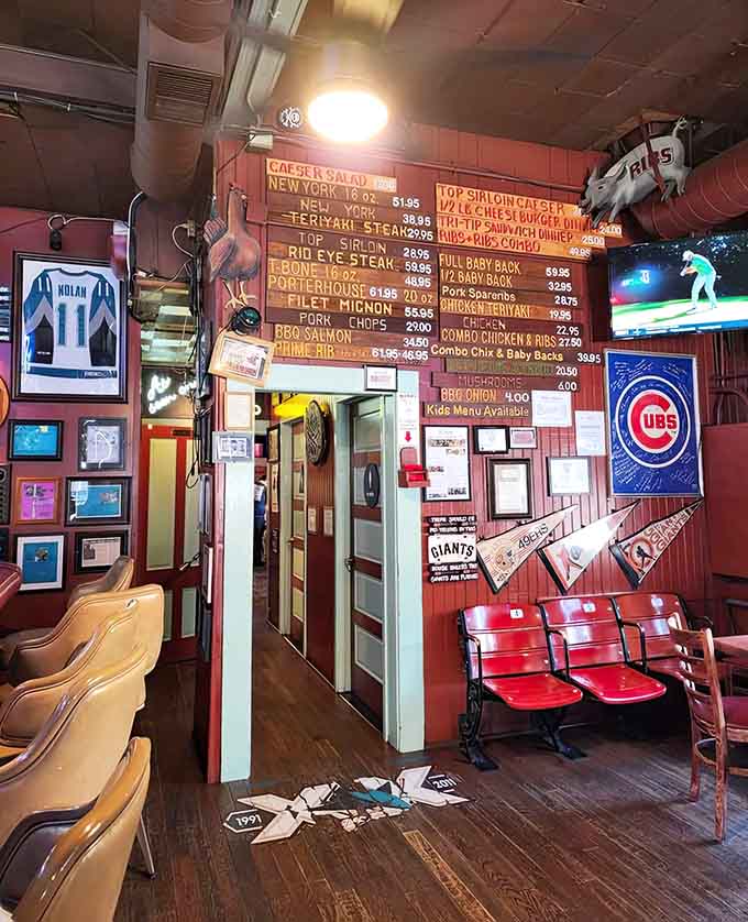Stadium seats as decor and sports memorabilia everywhere, because this place knows exactly what it is and owns it.