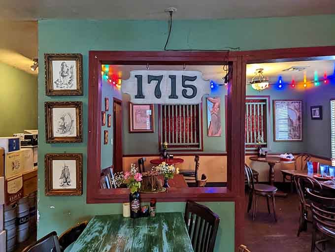 The number 1715 marks a cozy dining nook where fellowship and good food naturally happen together.