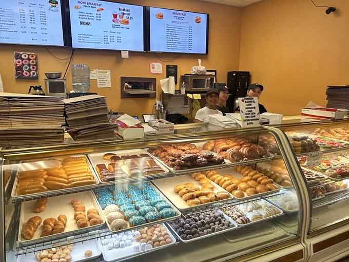 Behind that counter, magic happens daily while customers wait patiently for their turn at breakfast bliss.