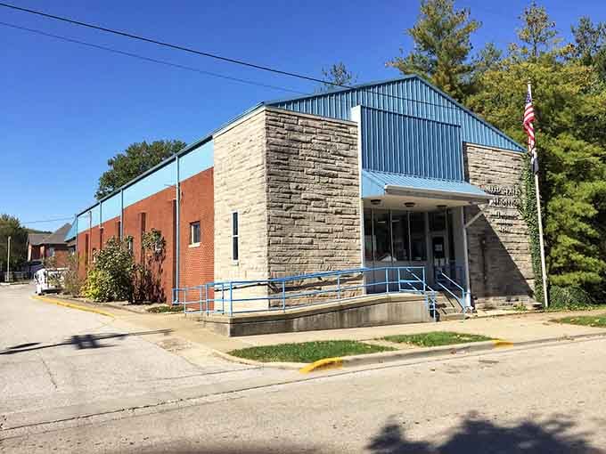 The postal service building stands solid and dependable, much like the mail carriers who've served generations of grateful residents.
