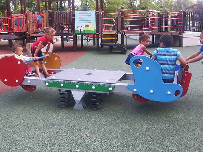 The seesaw gets a whimsical upgrade with bright colors that make this classic playground staple feel fresh.