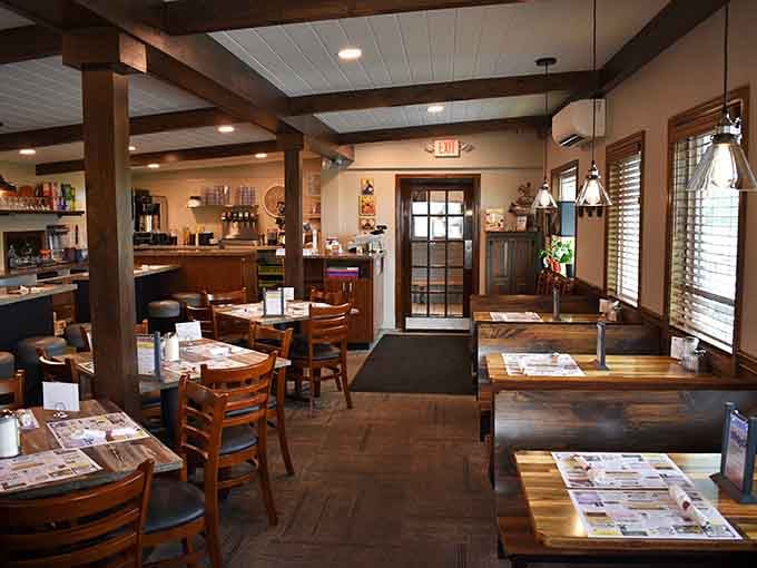 Dining room with booths and tables that give you breathing room, proving restaurants can be busy without feeling like sardine cans.