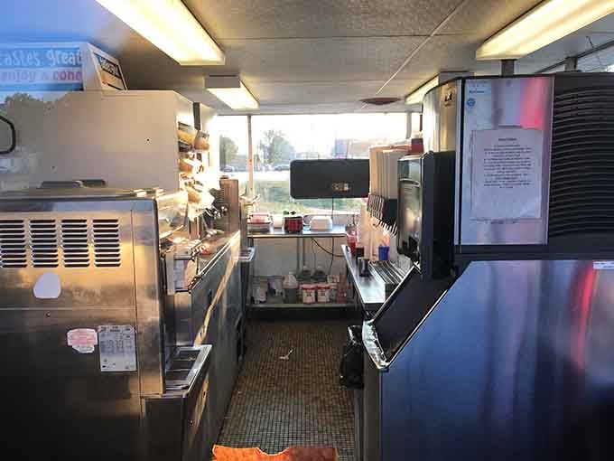 The compact kitchen shows how efficiency and quality can coexist beautifully when you've perfected your craft over decades.