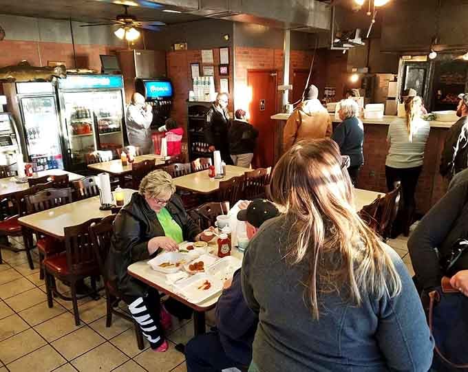 Real people eating real barbecue in a real neighborhood spot where the food does all the talking it needs.