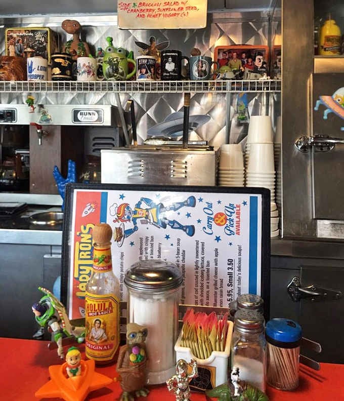 Condiments share counter space with tiny robots because normal restaurants are clearly too boring for this.