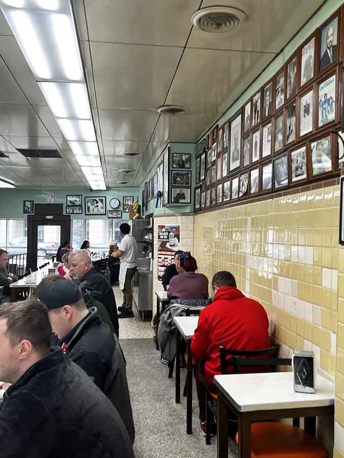 The lunch crowd fills every seat, a beautiful mix of locals who know this place represents Detroit's delicious heart.