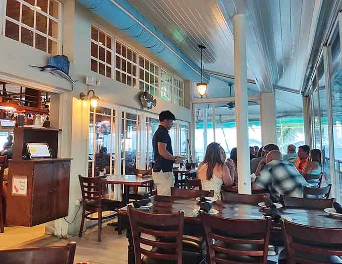 Dining tables overlooking turquoise waters where even your phone can't compete with views this spectacularly distracting and gorgeous.