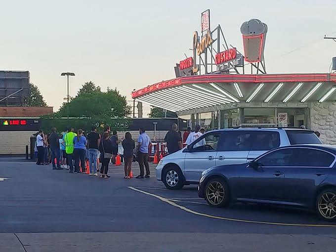 The evening crowd gathers like pilgrims at a delicious shrine, because some things are absolutely worth the wait, friends.