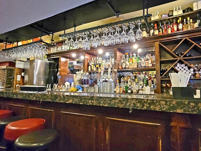 A well-stocked bar ready to pour whatever pairs perfectly with your coal-fired pizza of choice tonight.