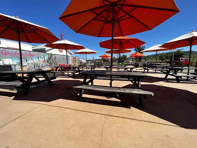 Orange umbrellas dot the patio like a Christo installation, except this art you can actually sit under comfortably.