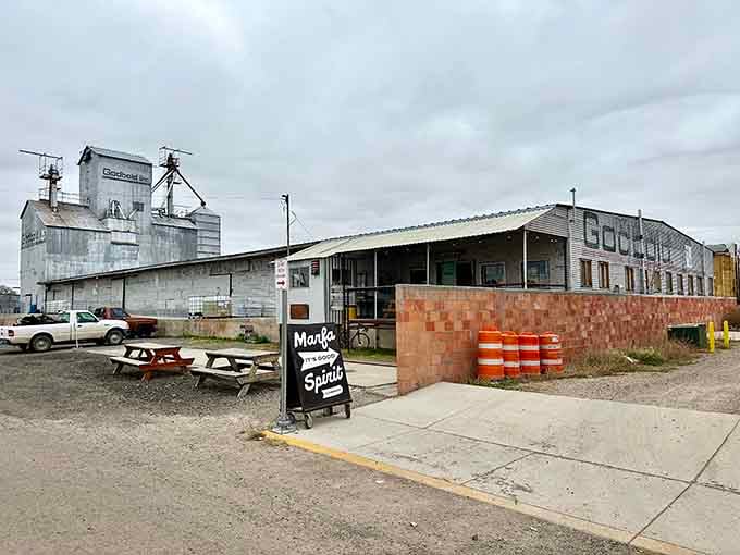 The old grain elevator backdrop makes Marfa Spirit Co. look like it&rsquo;s serving spirits with a side of industrial art.