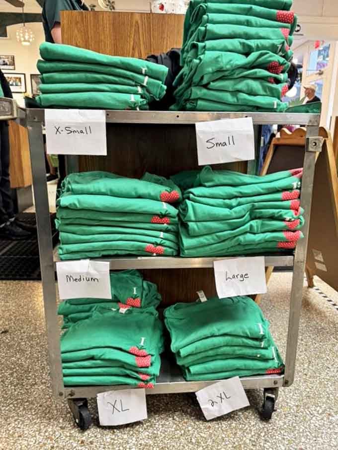 Those neatly stacked green aprons tell a story of organization and tradition&mdash;each size ready for the day's spaghetti adventures.