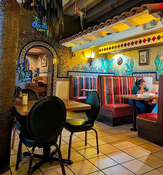 Vibrant booths with serape-striped upholstery create cozy nooks where countless memorable meals have been devoured with gusto.