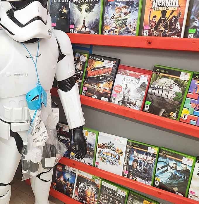 Video games and a Stormtrooper standing guard, because even Imperial forces appreciate a good bargain on entertainment.