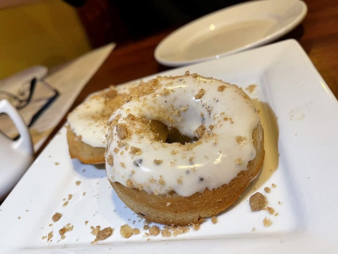 A glazed donut that looks like it's been kissed by cinnamon angels and sprinkled with graham cracker fairy dust.