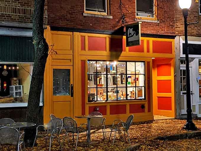 Autumn leaves frame this vibrant storefront like nature's Instagram filter, highlighting small-town retail therapy at its most charming.