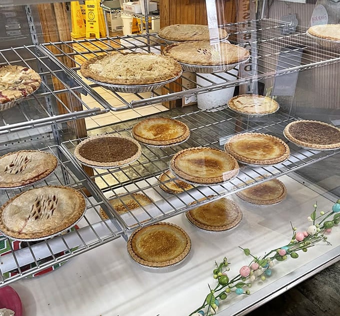 Cooling racks loaded with fresh pies, proof that good things really do come to those who bake.