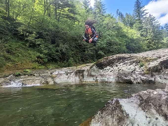 Mid-air suspension captures that split second of courage before cold reality hits, literally freezing childhood memories into place forever.