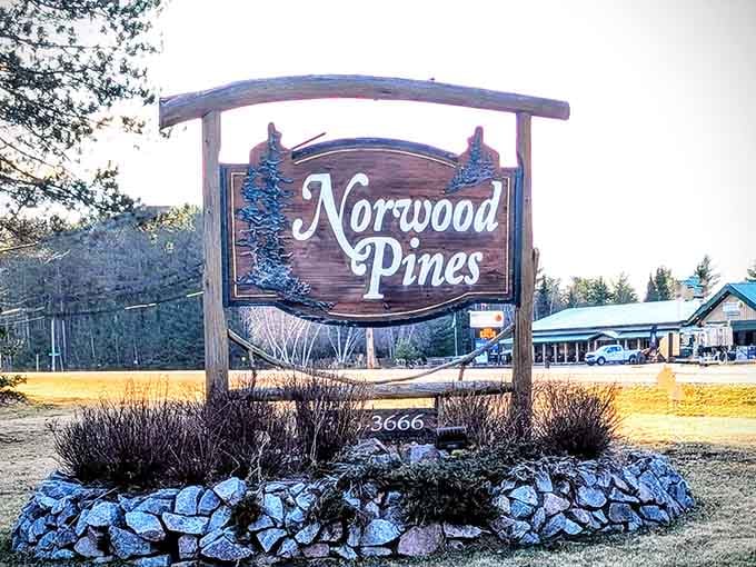 The Norwood Pines sign stands proudly, marking the spot where excellent food and Northwoods hospitality intersect perfectly.