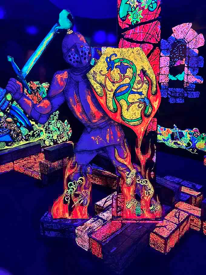 A glowing knight stands guard, making sure every putt is played with proper medieval honor.