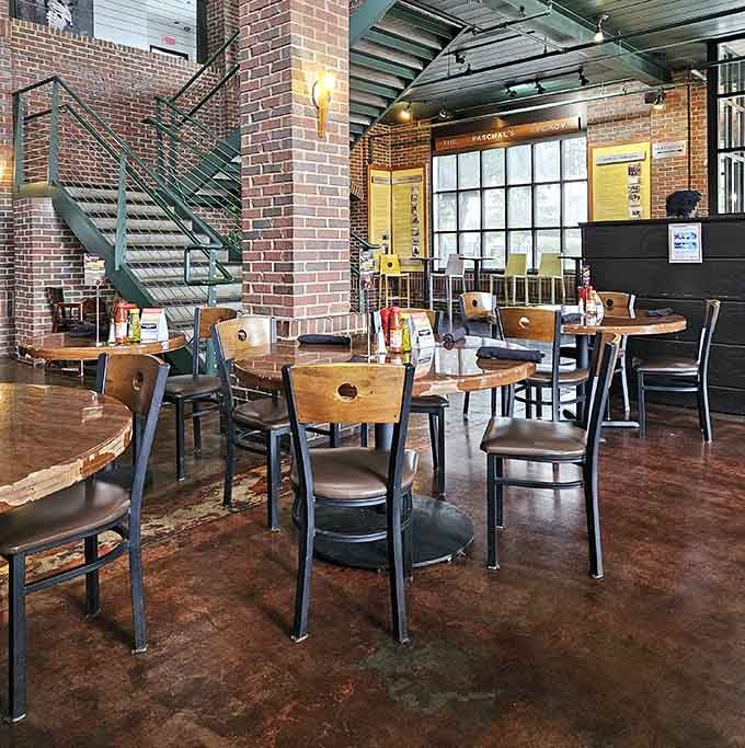 Industrial chic meets Southern warmth in a dining space that honors the past while embracing the present.