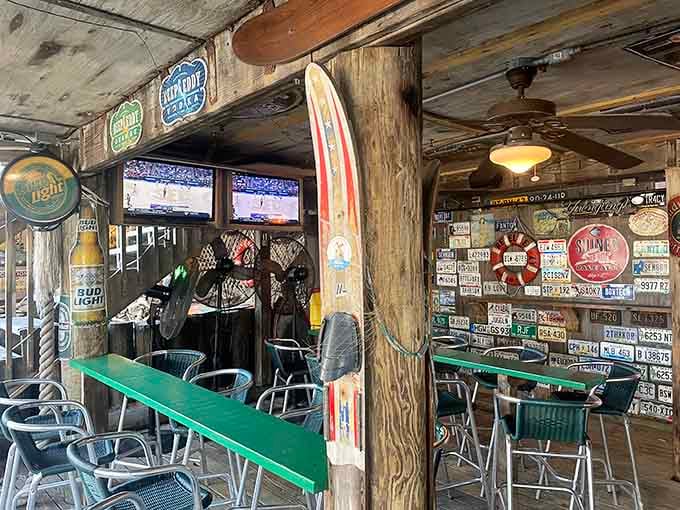 Weathered wood and license plates create that authentic beach dive atmosphere you simply can't manufacture or fake.