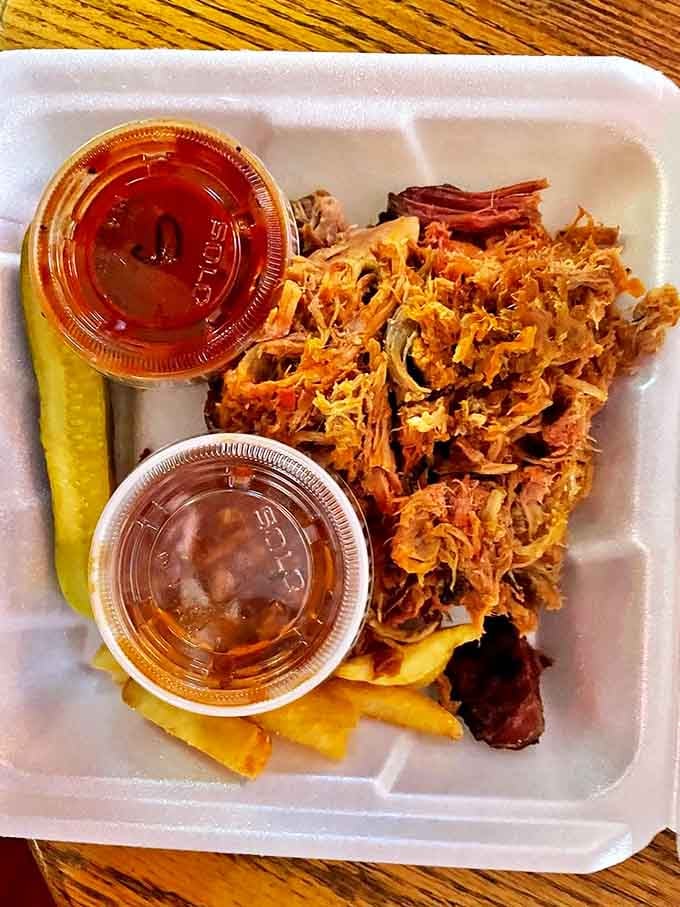 Pulled pork that's had more quality time in the smoker than most people spend on vacation. Served with sauce options that complement rather than overwhelm.