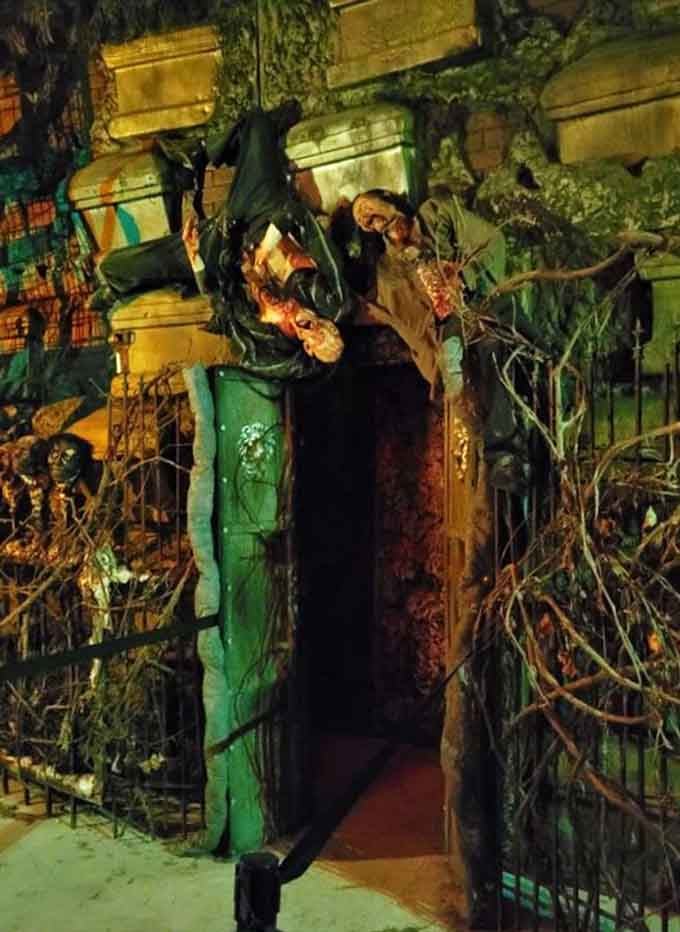 That burlap-masked figure standing guard ensures you know exactly what you're getting yourself into here tonight.