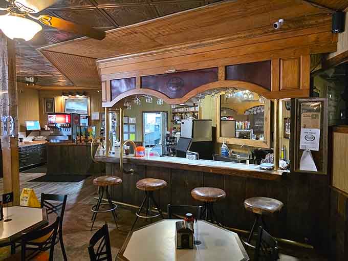 The bar where your bartender works under a ceiling that's literally been here since dinosaurs roamed.