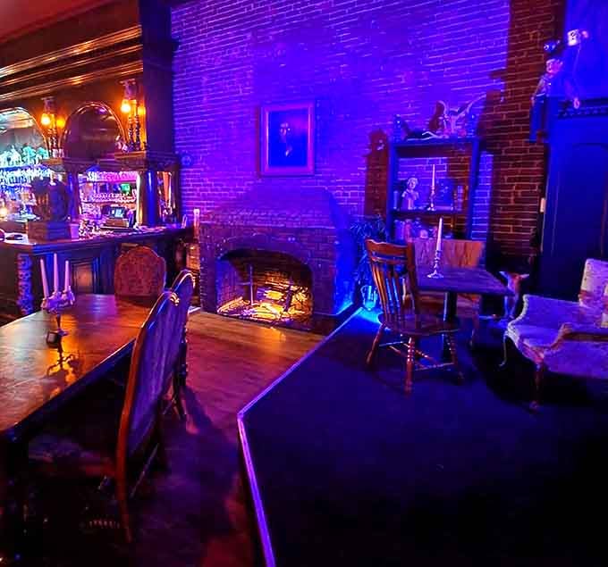 That fireplace adds warmth to the gothic atmosphere, proving even dark spaces need a little coziness.