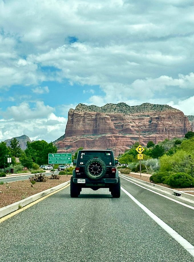 Following a Jeep into the red rock wonderland, because some views demand to be chased.