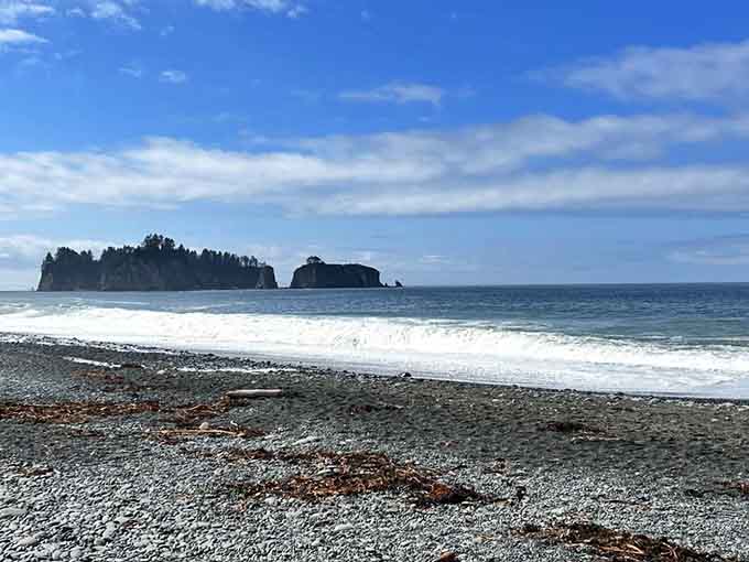 Waves roll in with relentless energy, reminding visitors that the ocean never takes a day off from being impressive.