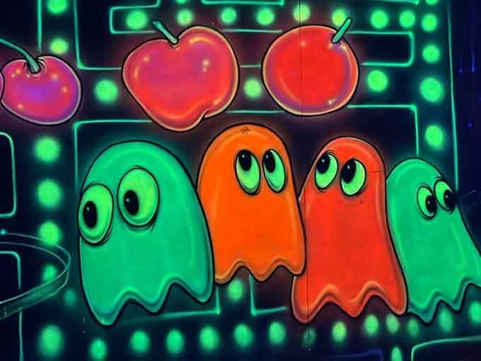 Pac-Man ghosts glow cheerfully, far less menacing than they were when they devoured your quarters in 1982.
