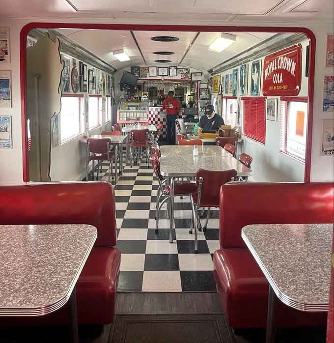 Those red vinyl booths stretch invitingly down the aisle, practically begging you to slide in and stay awhile.