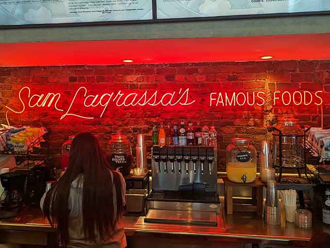 That neon "Sam LaGrassa's Famous Foods" sign glows like a beacon of hope for the perpetually hungry masses.