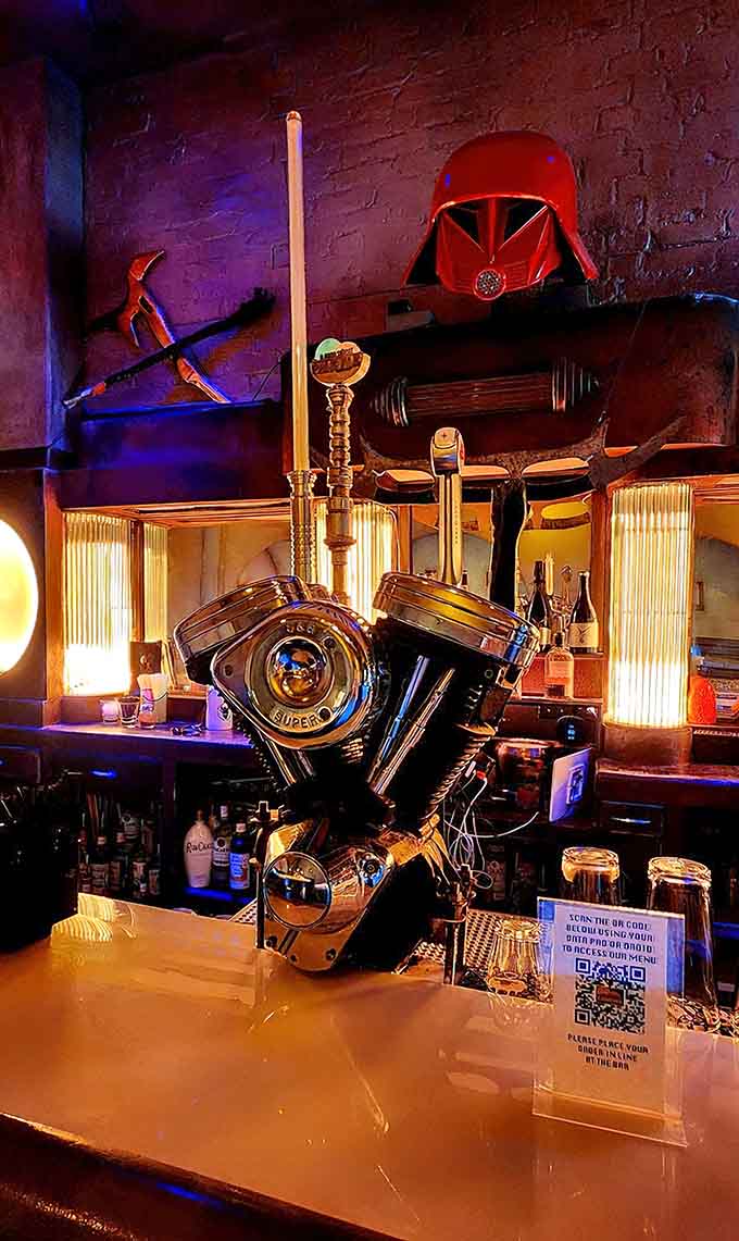 Behind the bar, a droid-like tap system dispenses libations while Darth Vader's helmet watches over the proceedings approvingly.