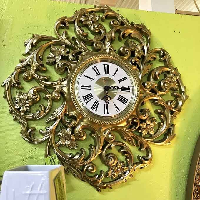 An ornate wall clock that's equal parts timepiece and baroque sculpture, because telling time should always be dramatic.