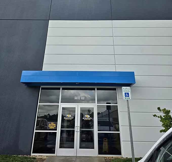 The unassuming entrance that hides more fun than you'd find in a dozen regular Saturday afternoons combined.