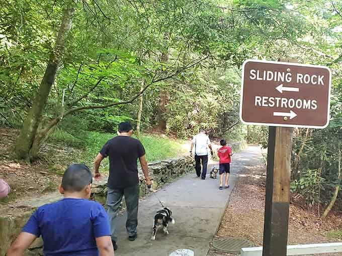 The path to Sliding Rock builds anticipation with every step toward that refreshing mountain water experience.