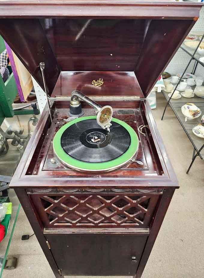 That Pathé phonograph played music back when listening was an event, not background noise.