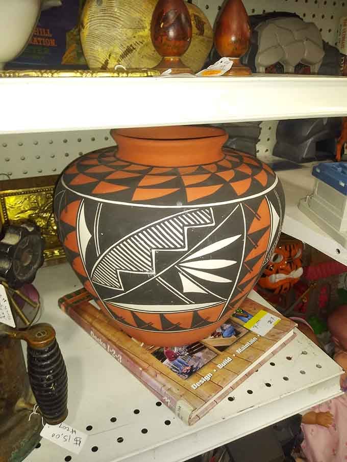 Hand-painted geometric pottery sits gracefully, its traditional patterns speaking to craftsmanship that predates assembly lines and mass production entirely.