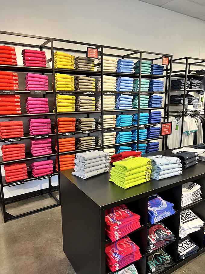 Hugo Boss shirts stacked like a rainbow of sophistication, proving luxury doesn't always require luxury pricing.