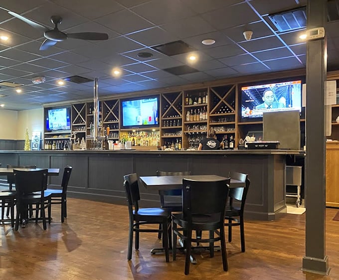 The bar area invites you to settle in with a cold drink while you wait for pizza magic.