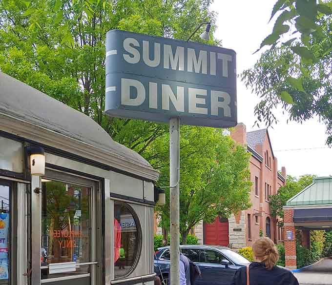 That vintage sign has been guiding hungry travelers to great food longer than most GPS systems existed.