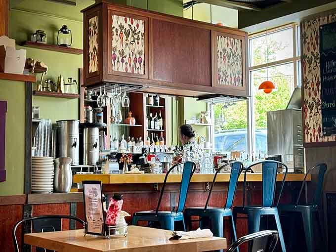 Counter seating offers front-row views to the breakfast magic happening behind the scenes in this culinary theater.